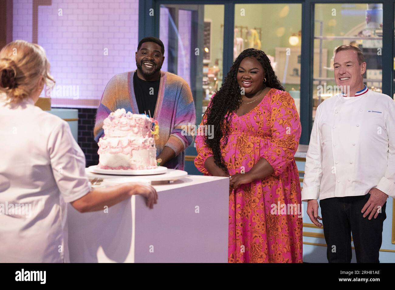 THE BIG NAILED IT BAKING CHALLENGE, from left: judge Ron Funches, host Nicole Byer, host Jacque ...