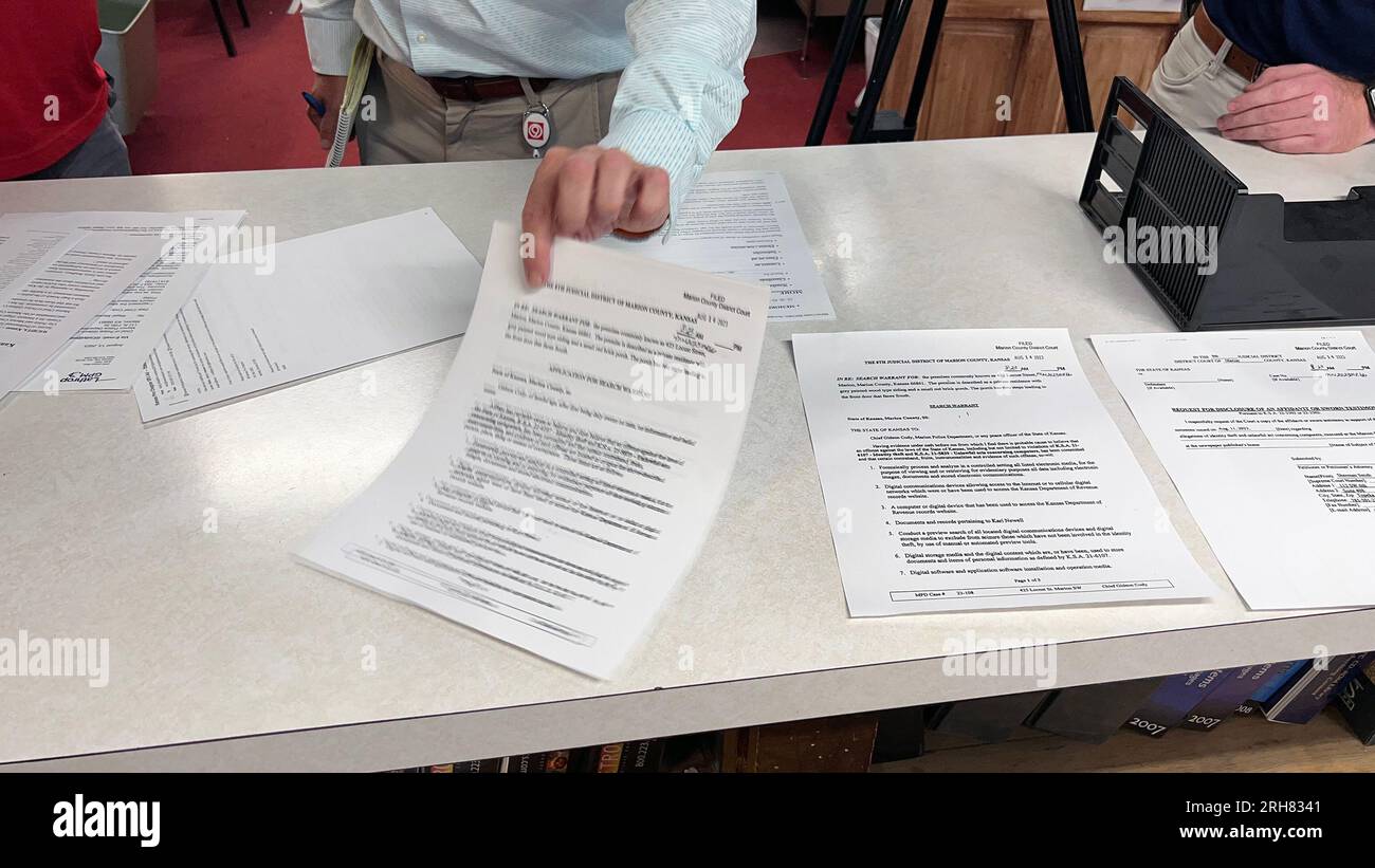MARION, KANSAS - AUGUST 14, 2023 Copies of the search warrant that was ...