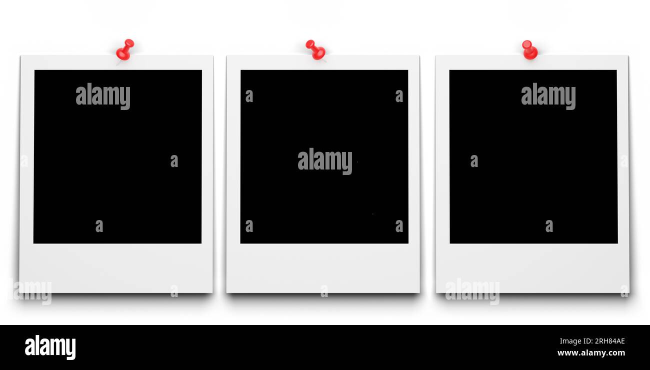 Three photo frames of different sizes, secured with a push pin. Empty ...