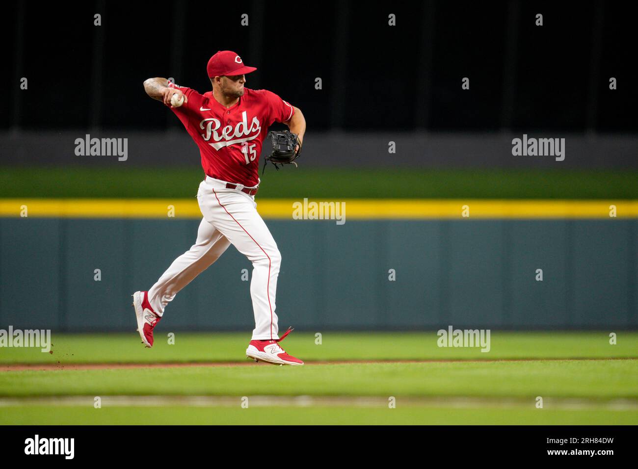 Cincinnati Reds third baseman Nick Senzel (15) looks to throw to first ...