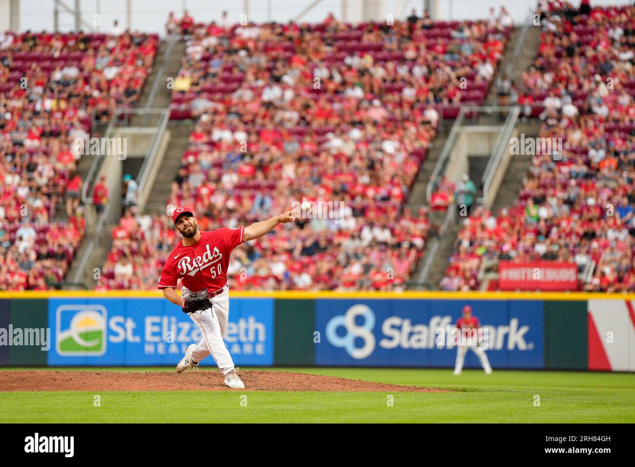 Cincinnati Reds relief pitcher Sam Moll (50) throws during a baseball ...