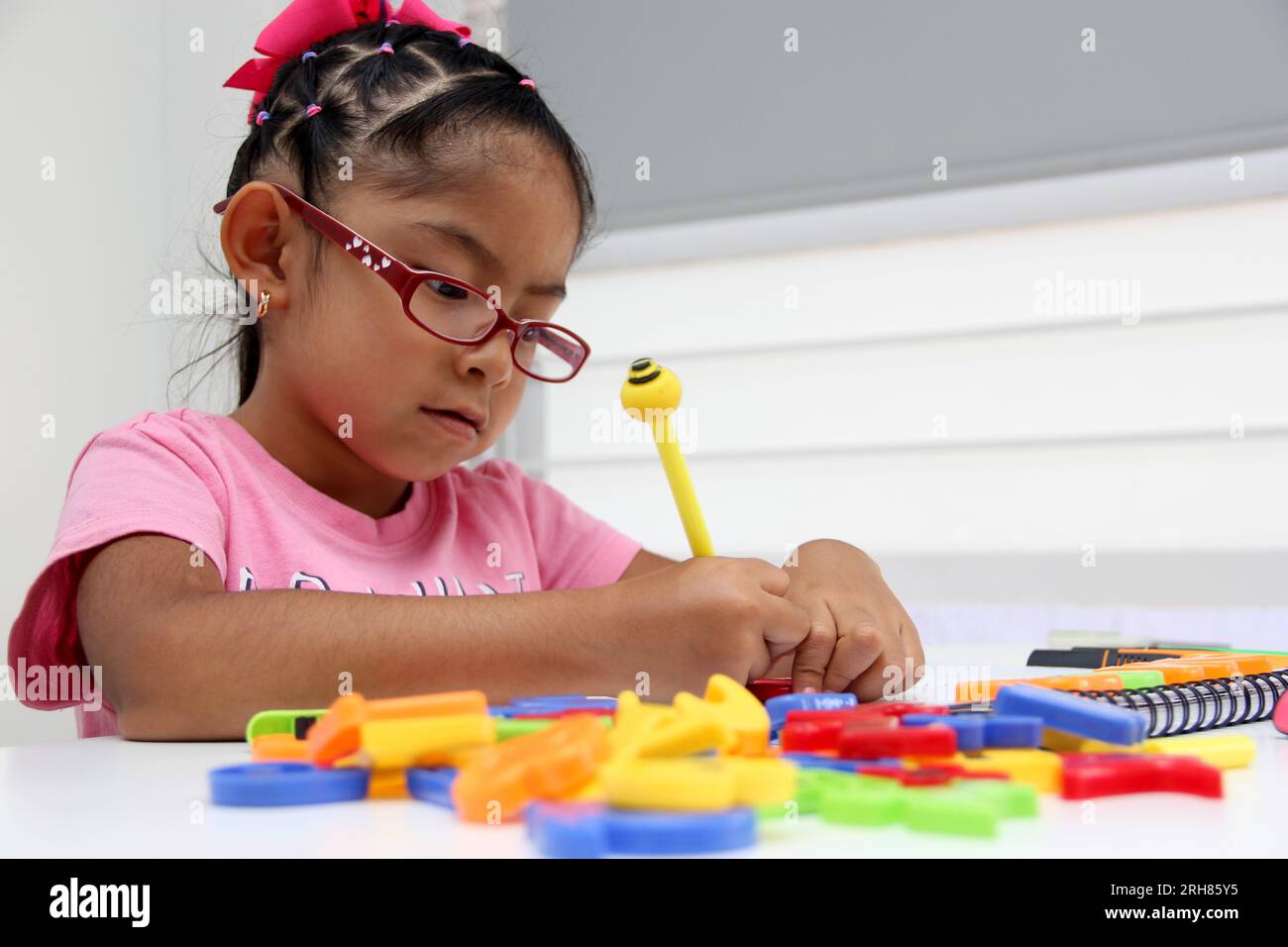 4-year-old brunette Latina girl with autism spectrum disorder ASD like ...