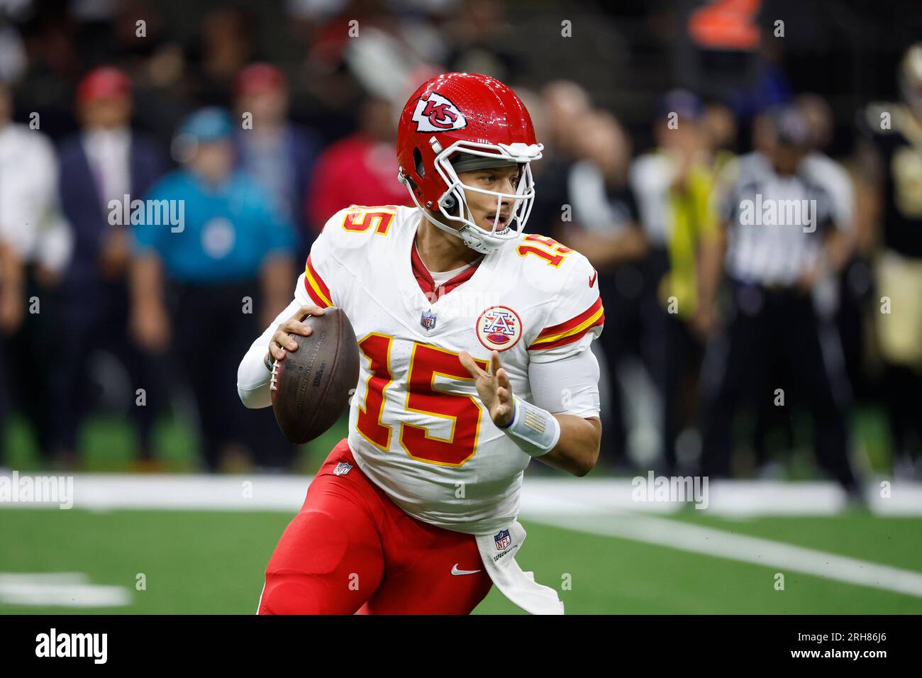 Kansas City Chiefs quarterback Patrick Mahomes rolls out to pass during ...