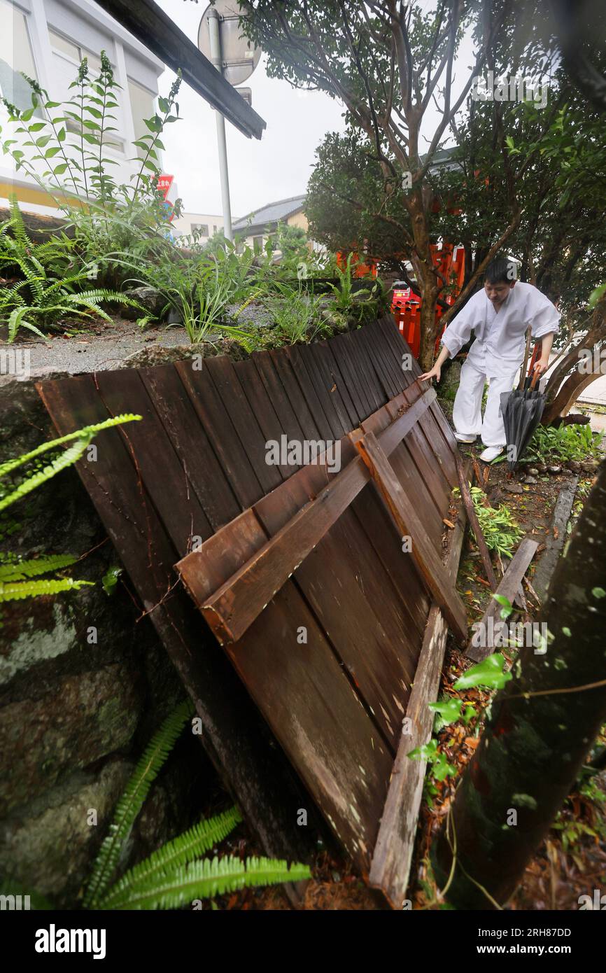 A wall is destroyed while Typhoon No.7 (Lan) landing the main island of ...