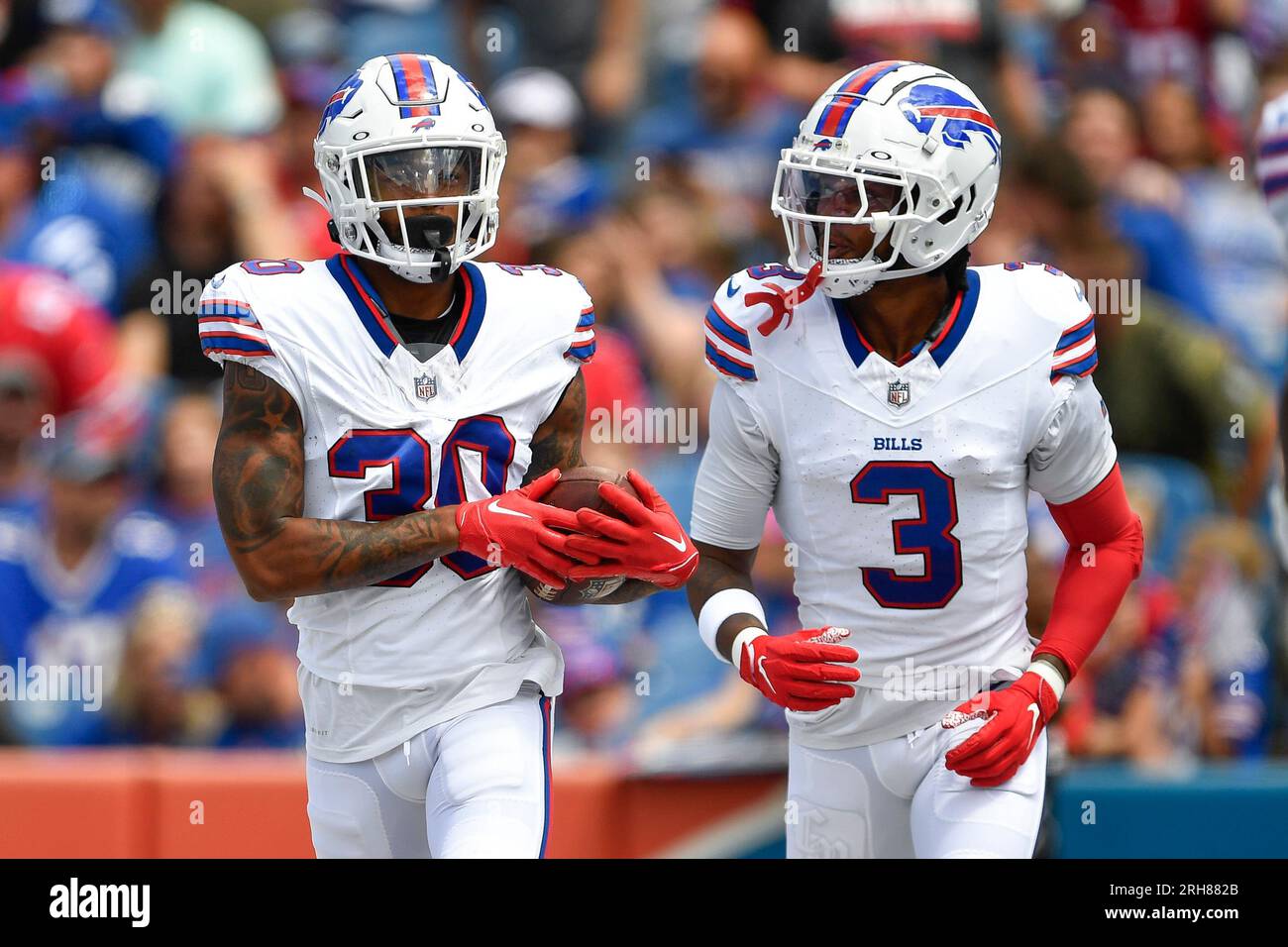 Buffalo Bills cornerback Dane Jackson, left, celebrates with safety ...