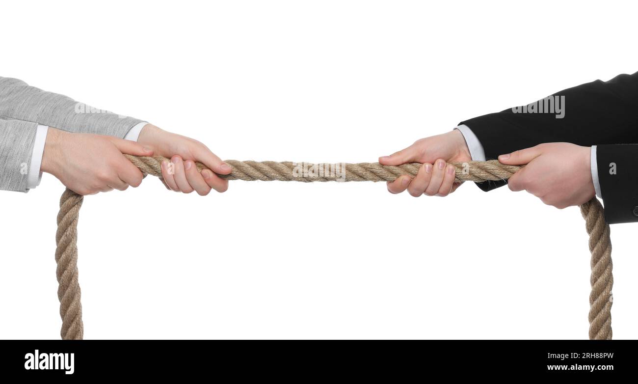 Dispute concept. Men pulling rope on white background, closeup Stock ...