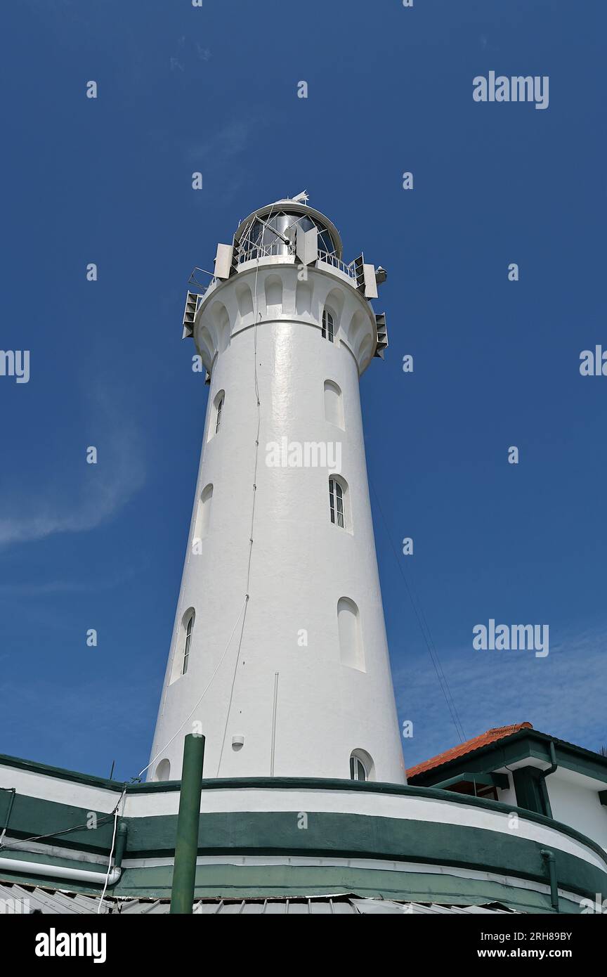 Cylindrical white tower of the Raffles Lighthouse, located on Pulau ...