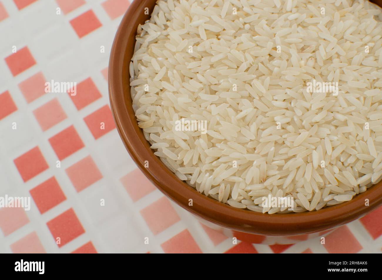 Raw rice grains in evidence, providing a unique texture and flavor to ...