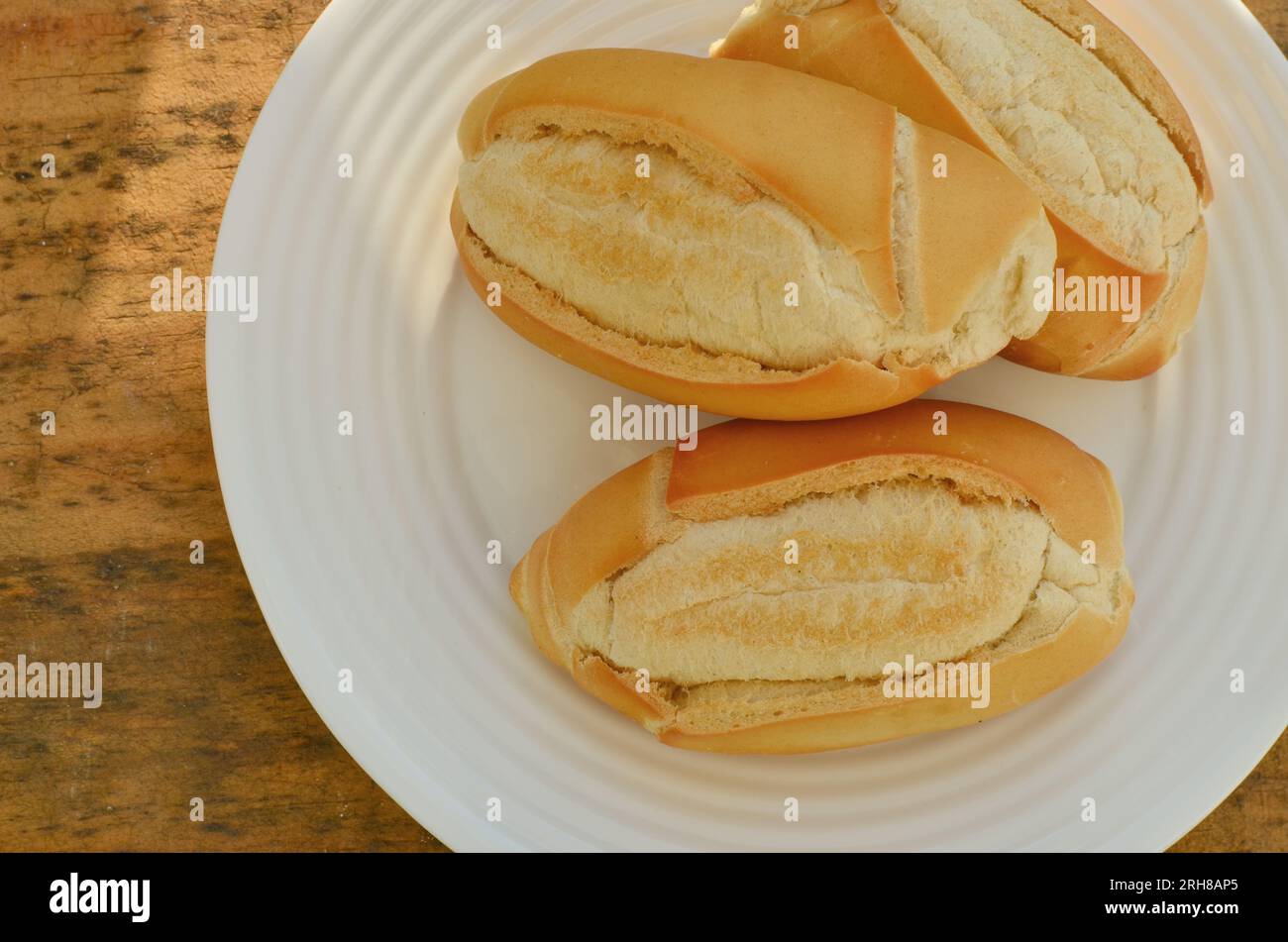 French bread fresh out of the oven, with its crispy crust and soft core ...