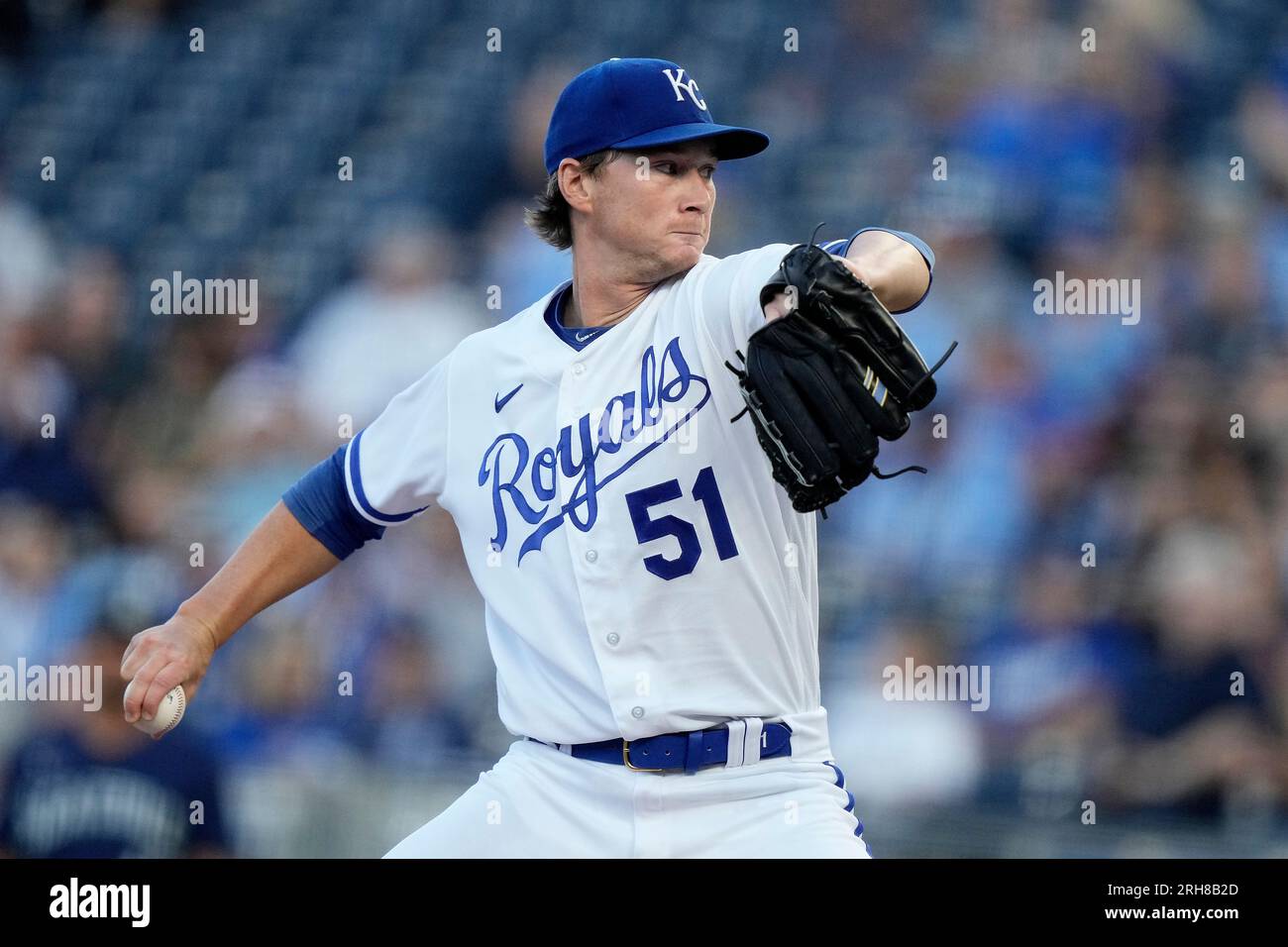 Kansas City Royals starting pitcher Brady Singer throws during the ...
