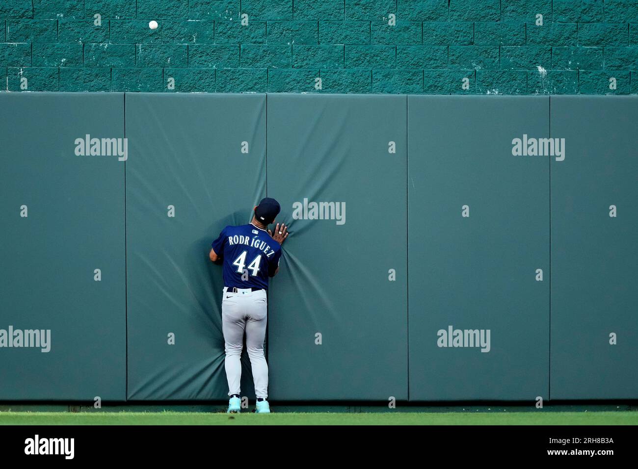 Seattle Mariners center fielder Julio Rodriguez chases after a three ...