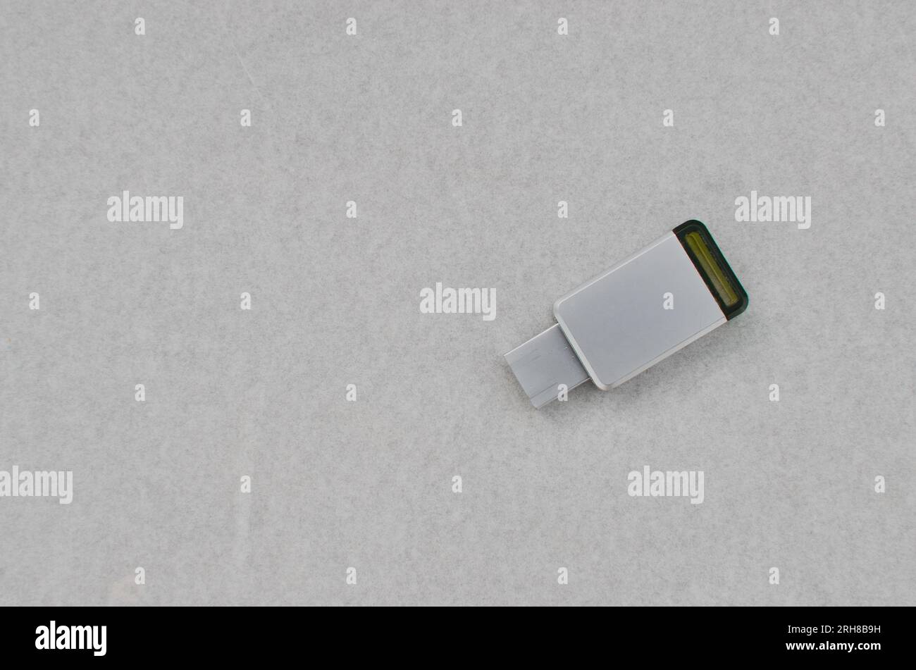 Aluminum flash drive close-up, modern and sturdy USB storage stick ...