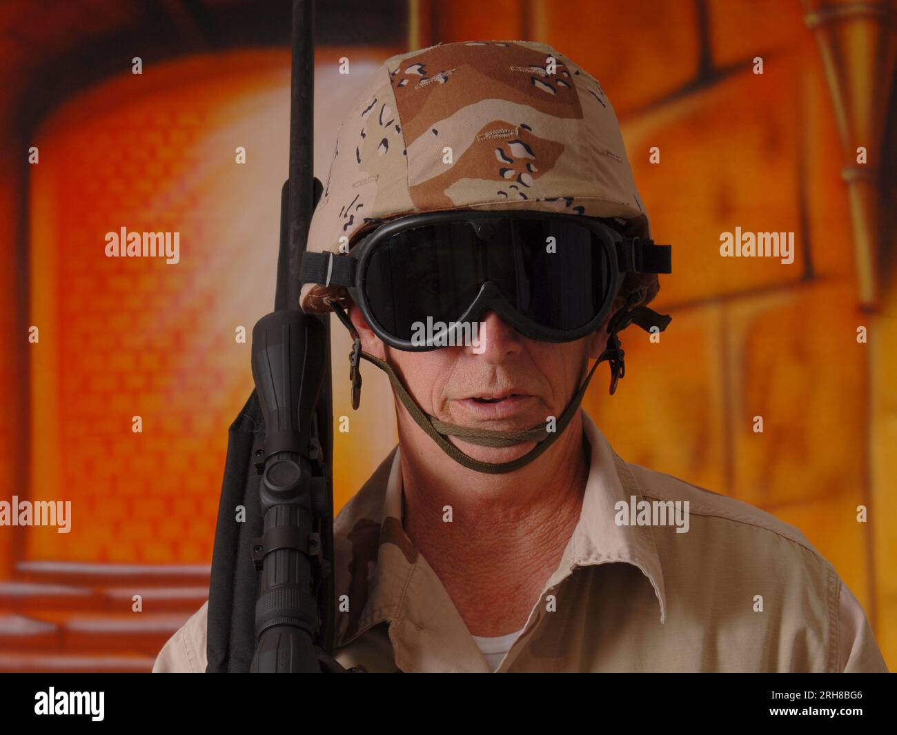 Camouflaged old soldier with sniper rifle inside building Stock Photo ...