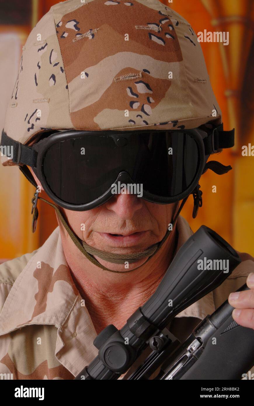 Camouflaged old soldier with sniper rifle inside building Stock Photo ...