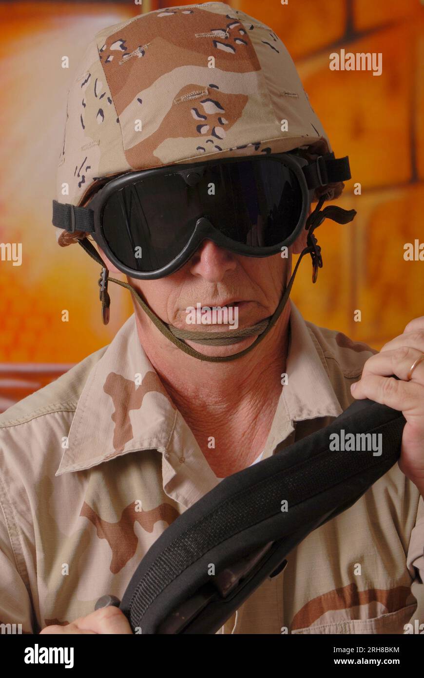 Camouflaged old soldier with sniper rifle inside building Stock Photo ...
