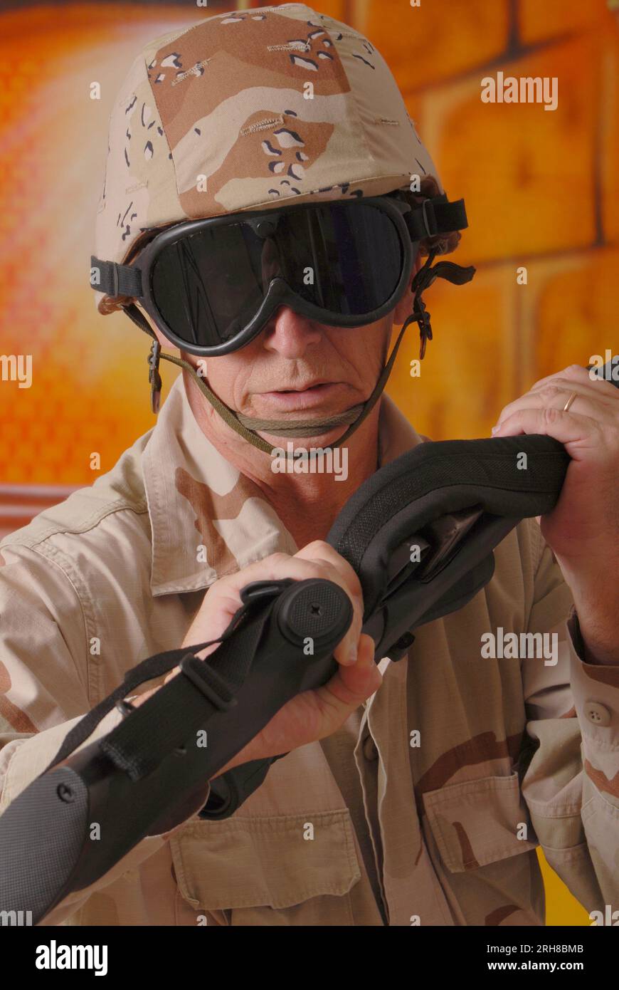 Camouflaged old soldier with sniper rifle inside building Stock Photo ...