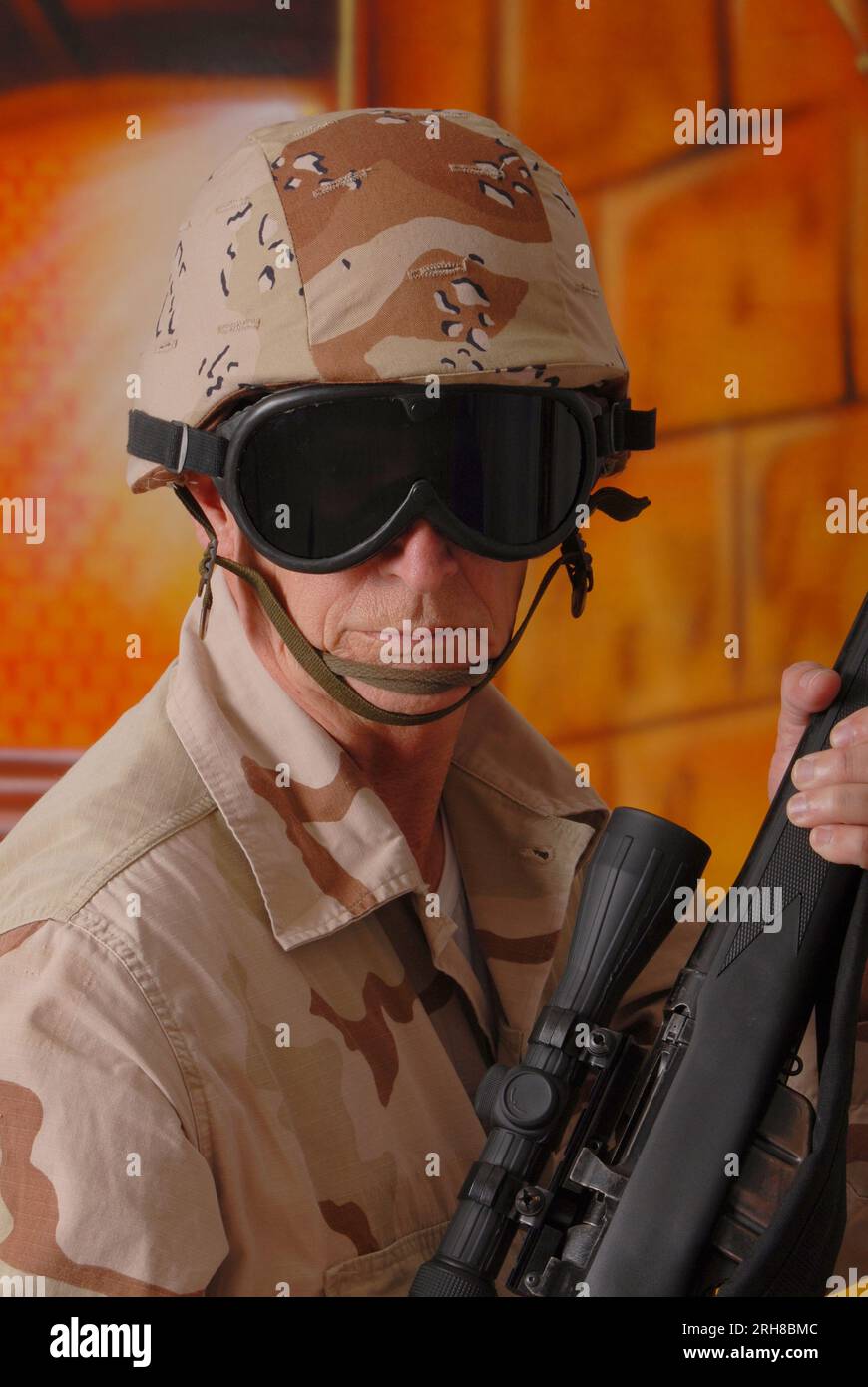 Camouflaged old soldier with sniper rifle inside building Stock Photo ...
