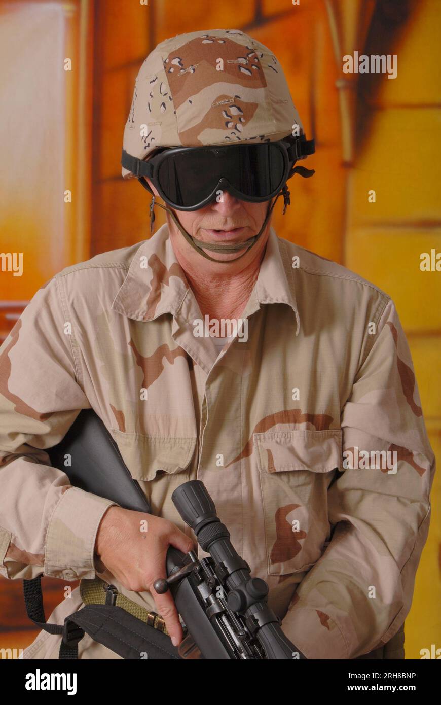 Camouflaged old soldier with sniper rifle inside building Stock Photo ...