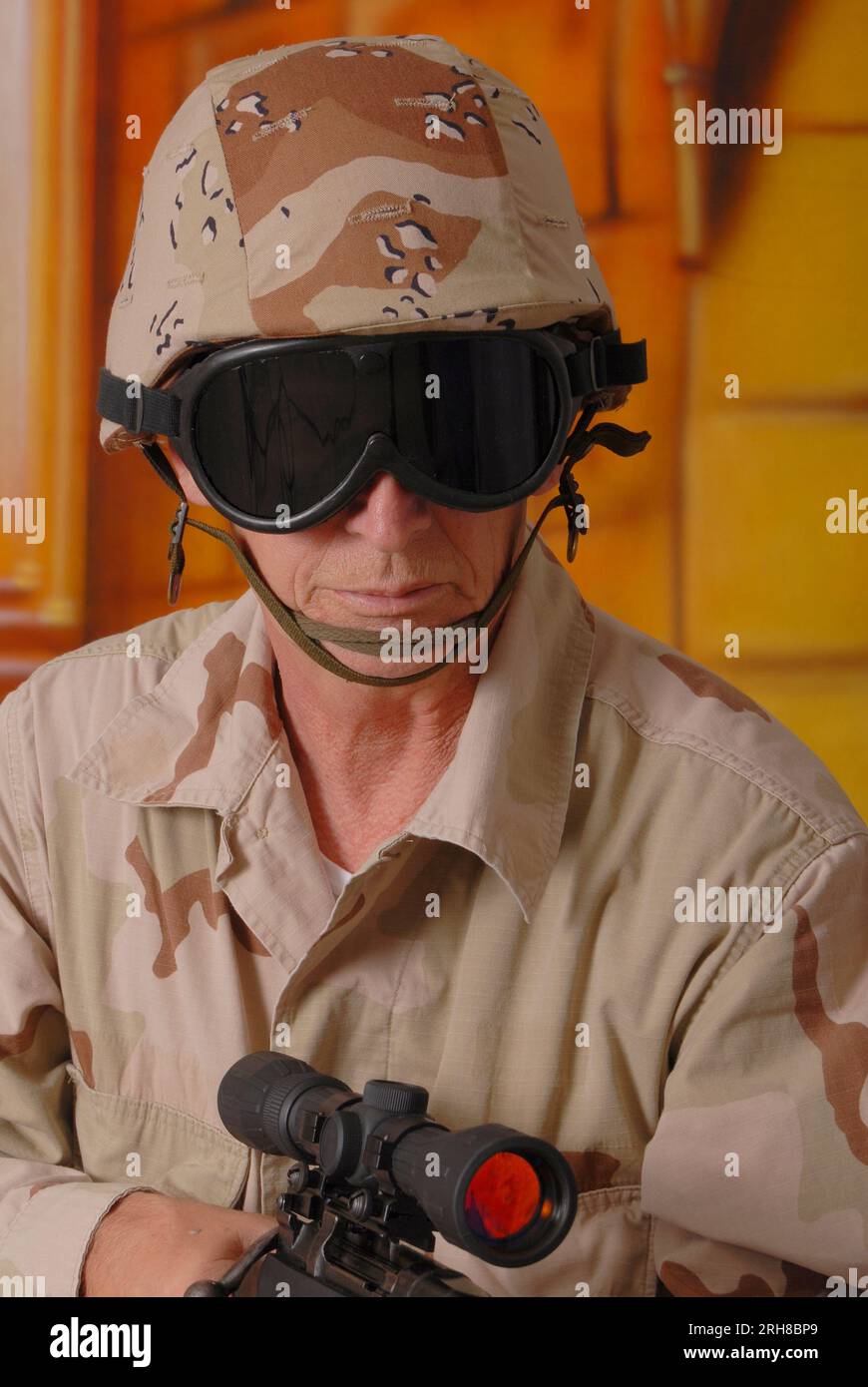 Camouflaged old soldier with sniper rifle inside building Stock Photo ...