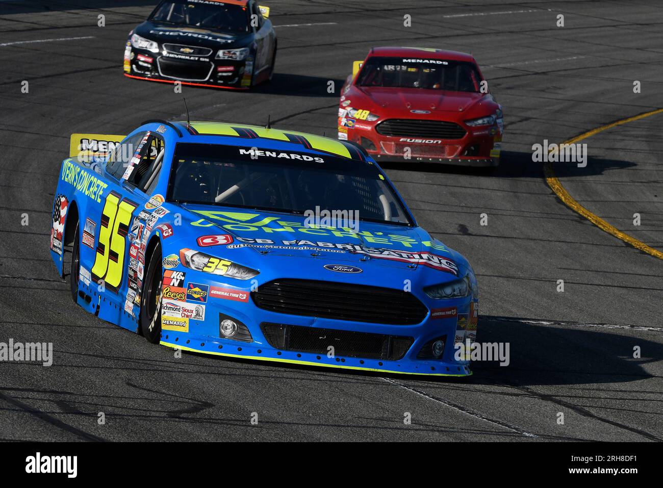 INDIANAPOLIS, IN - AUGUST 11: Greg Van Alst (35) Ford Fusion leads Brad ...