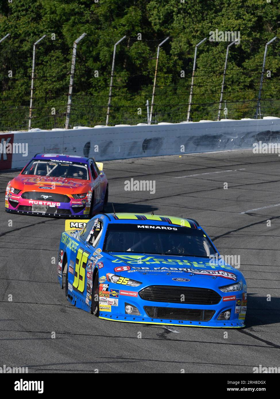INDIANAPOLIS, IN - AUGUST 11: Greg Van Alst (35) Ford Fusion leads ...