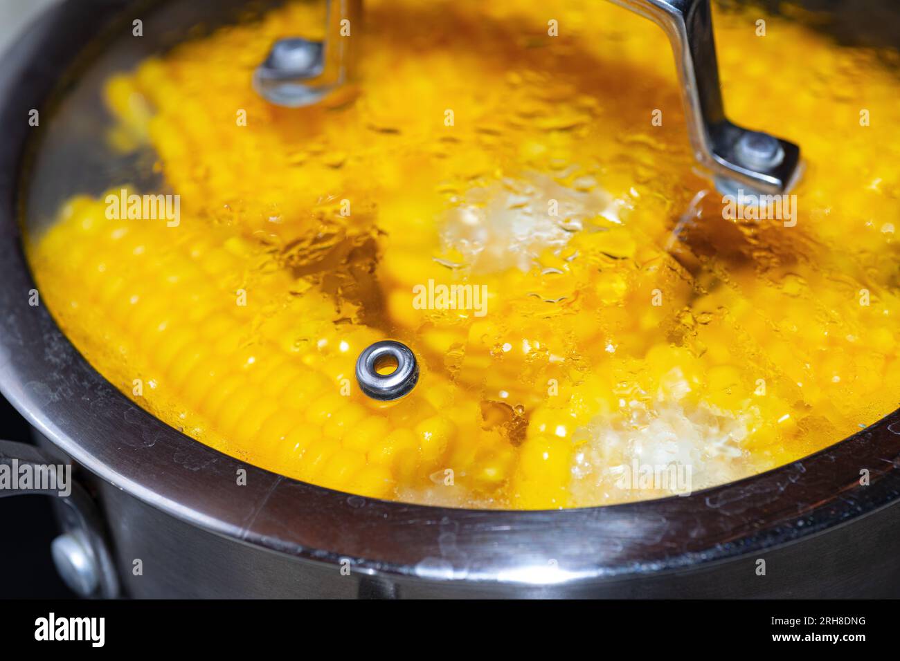 Corn cob boiling in pot hi-res stock photography and images - Alamy