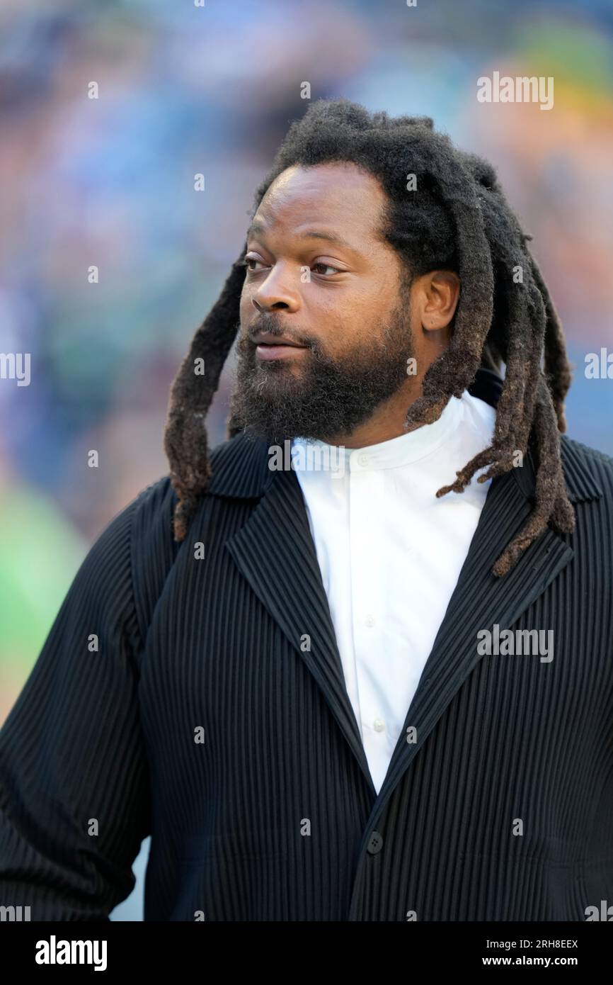 Former Seattle Seahawks linebacker Michael Bennett looks on before an ...