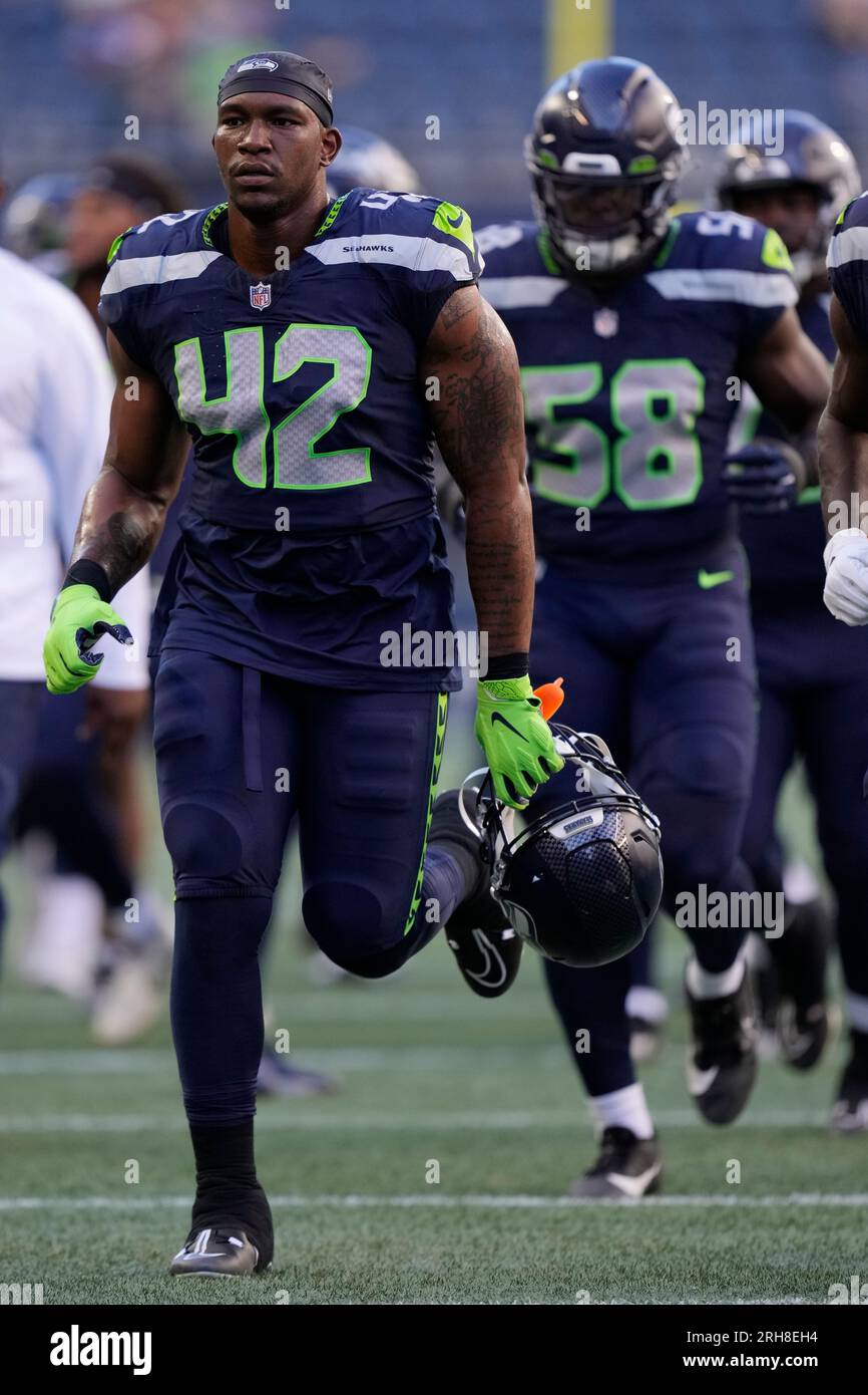 Seattle Seahawks defensive end Jordan Ferguson runs down the field ...