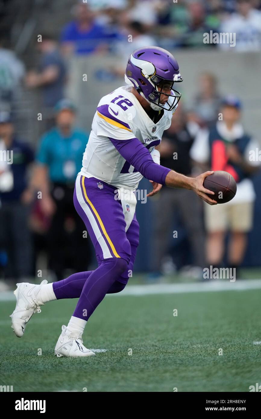 Minnesota Vikings quarterback Nick Mullens (12) hands off the ball ...