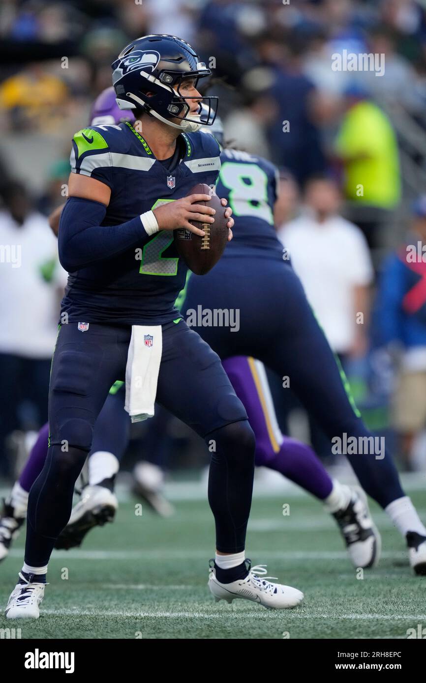 Seattle Seahawks quarterback Drew Lock (2) steps back to pass during an ...