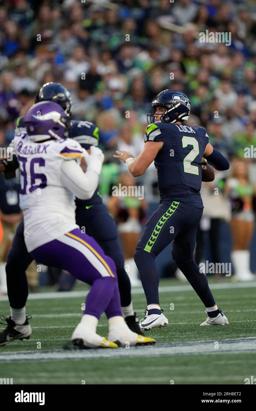 Seattle Seahawks quarterback Drew Lock (2) steps back to pass during an ...