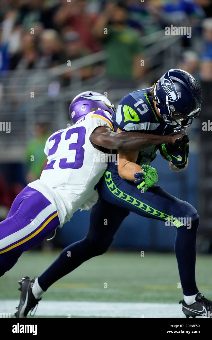 Minnesota Vikings cornerback Andrew Booth Jr. (23) attempts to tackle ...