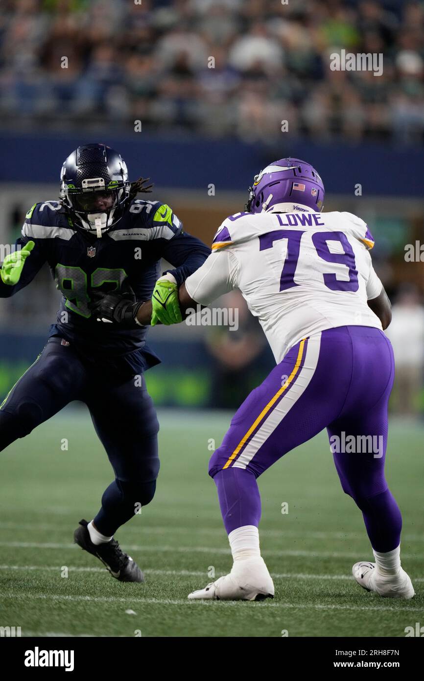 Minnesota Vikings offensive tackle Vederian Lowe (79) and Seattle ...