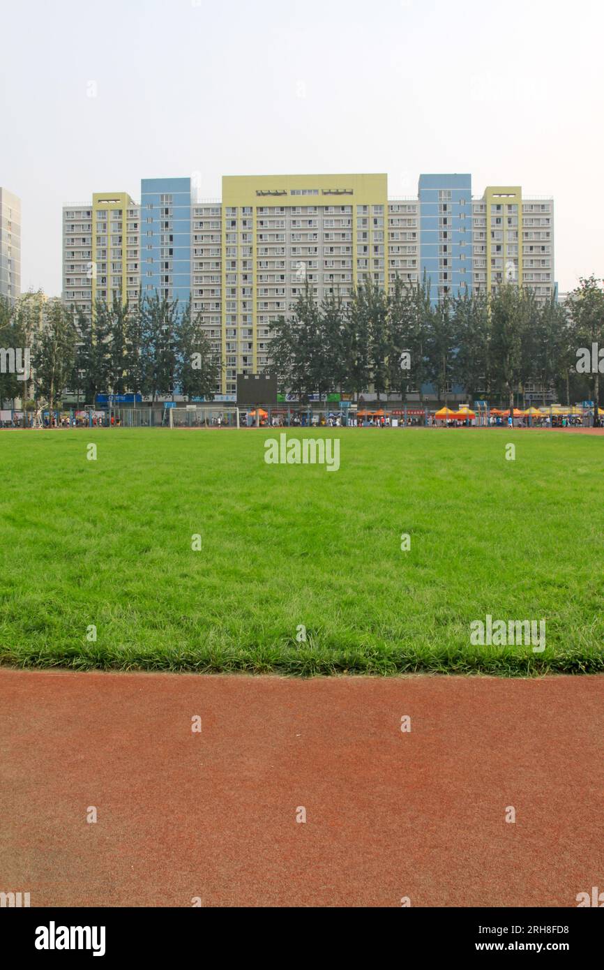 university campus landscape, playground and student dormitory building ...