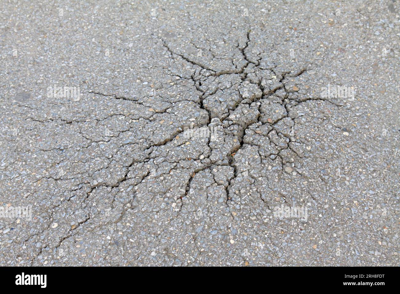 closeup of cracks on asphalt road Stock Photo - Alamy