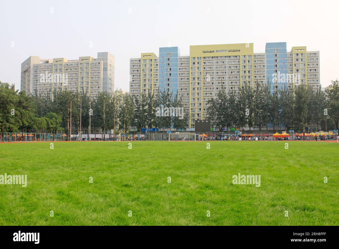 university campus landscape, playground and student dormitory building ...