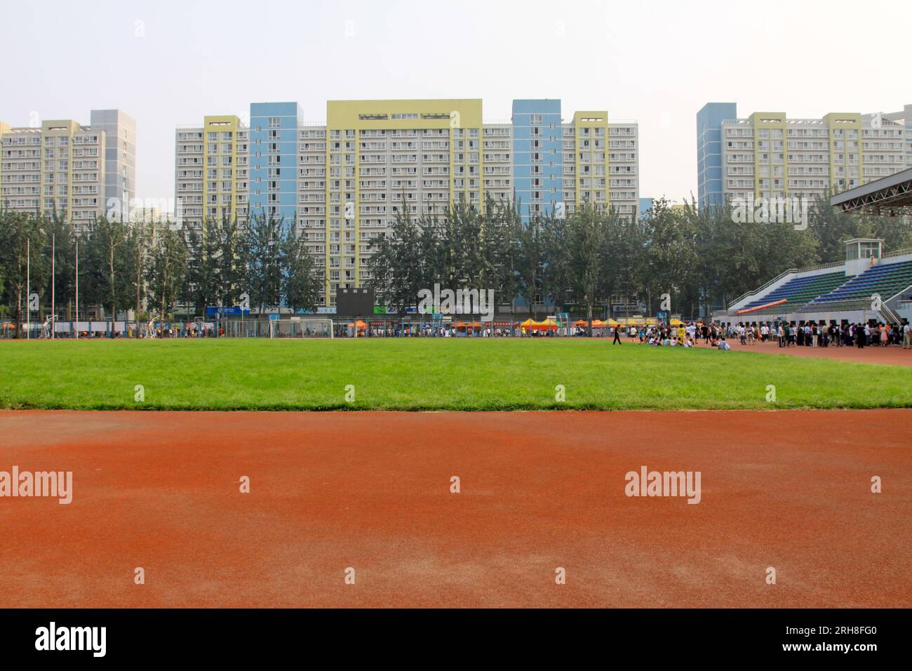 university campus landscape, playground and student dormitory building ...