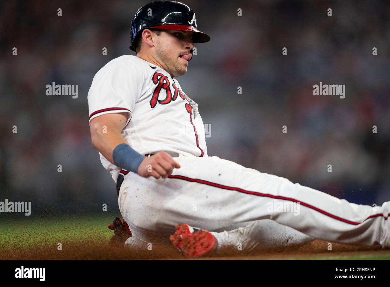 Atlanta Braves' Austin Riley slides into third base during the sixth ...