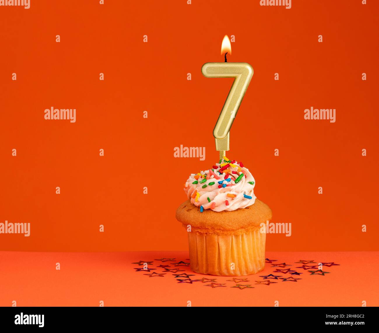 Number 7 candle - Birthday card design in orange background Stock Photo ...