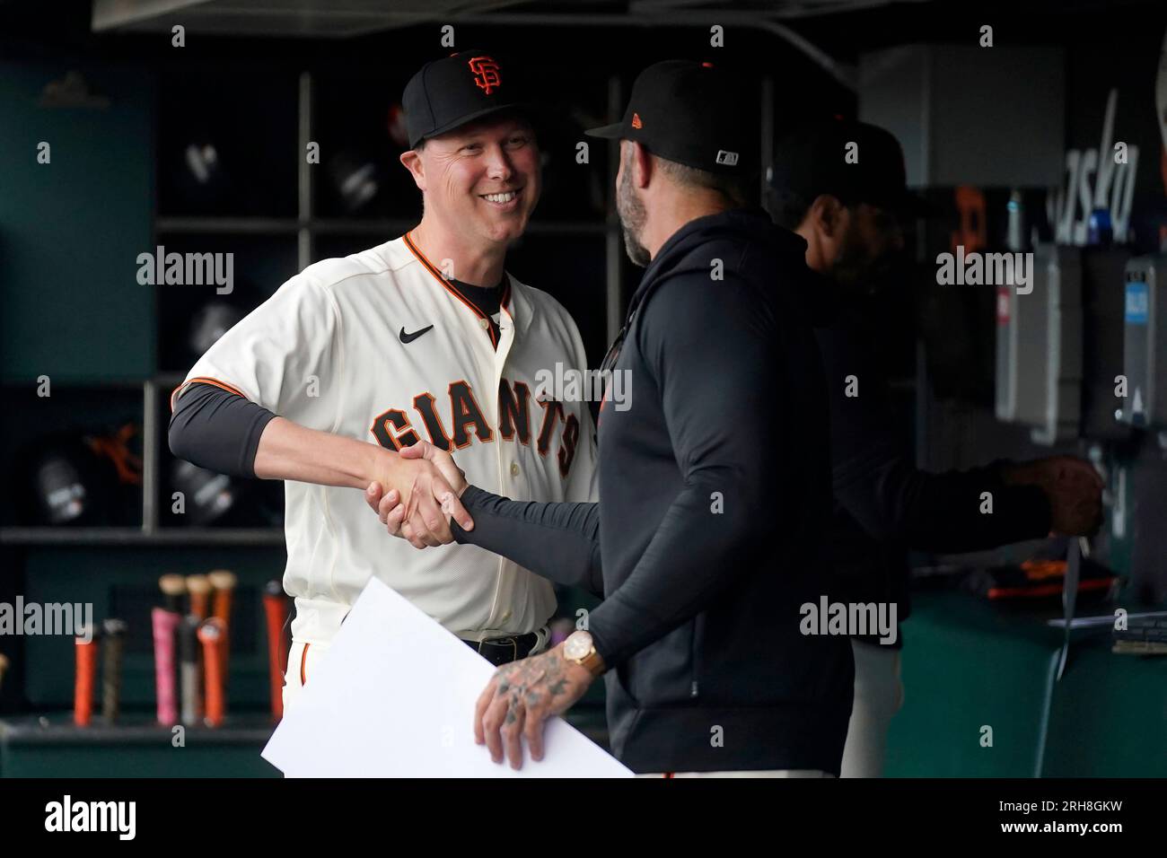 San Francisco Giants manager Gabe Kapler, right, shakes hands with ...