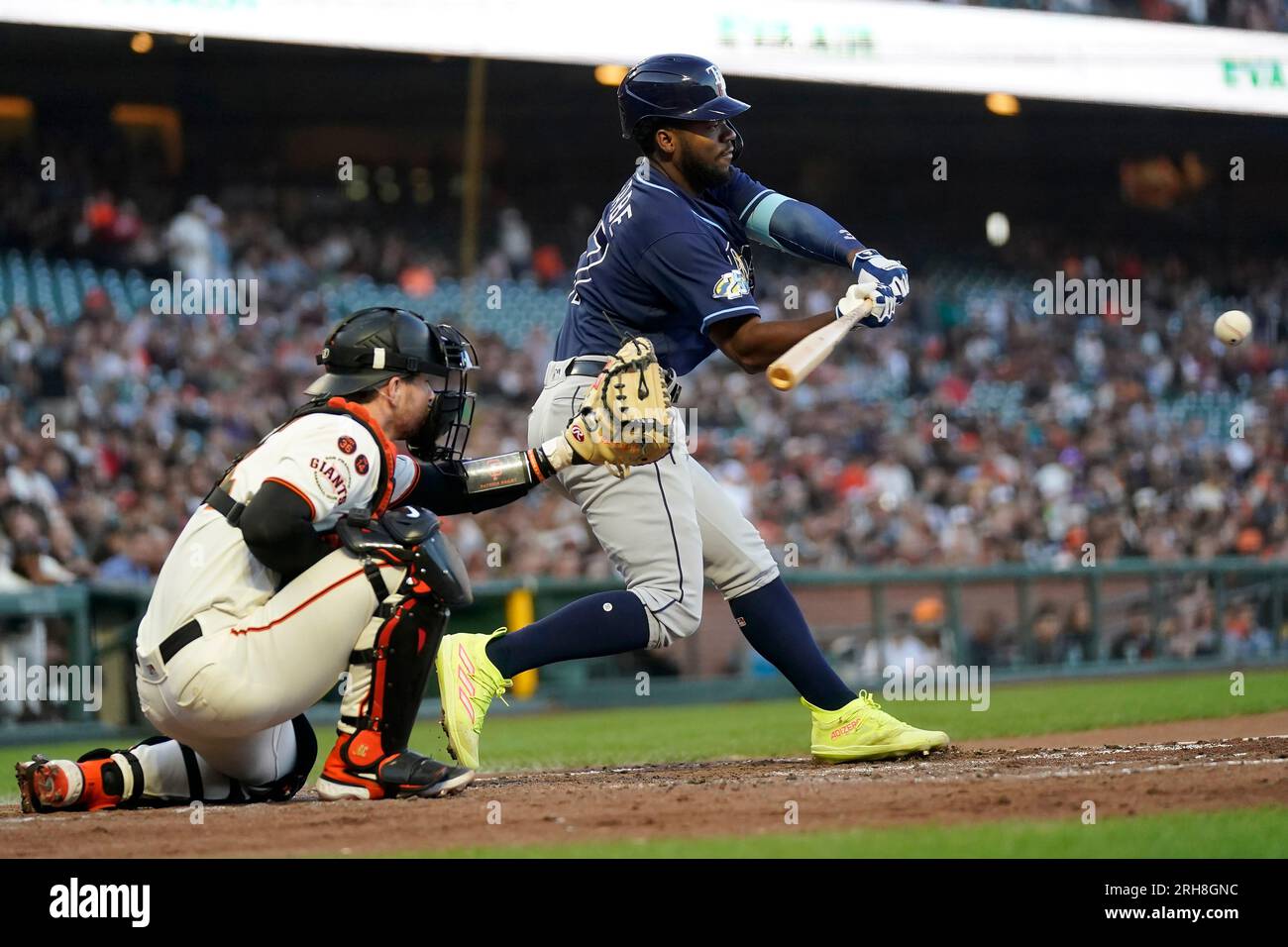 Tampa Bay Rays' Osleivis Basabe, right, hits a two-run single in front ...
