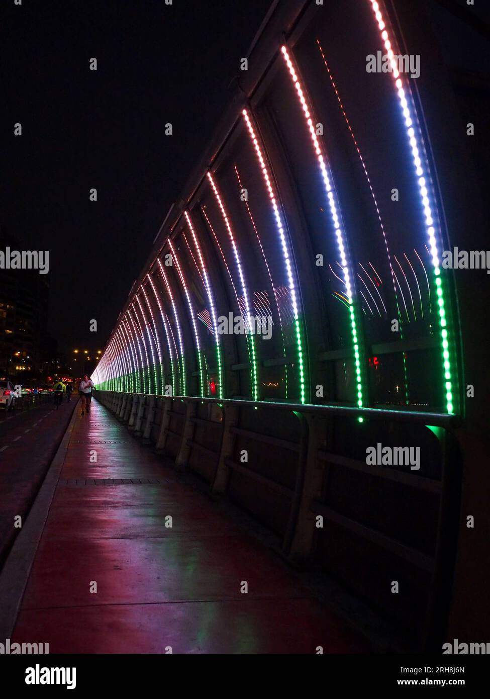 Miraflores, Peru. 14th Aug, 2023. Villena Bridge in Lima is Illuminated ...