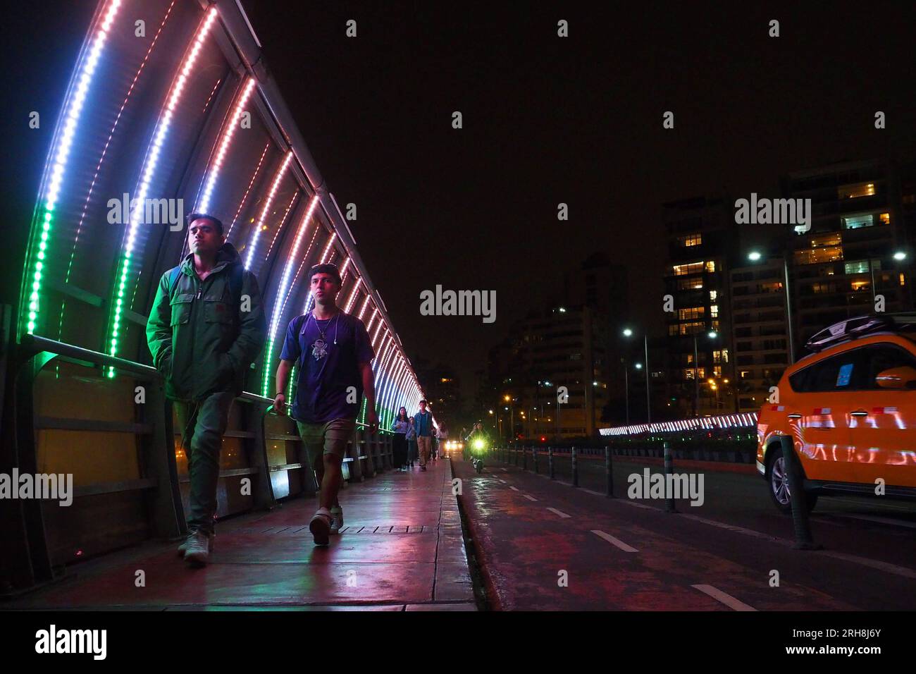 Miraflores, Peru. 14th Aug, 2023. People walking while Villena Bridge ...