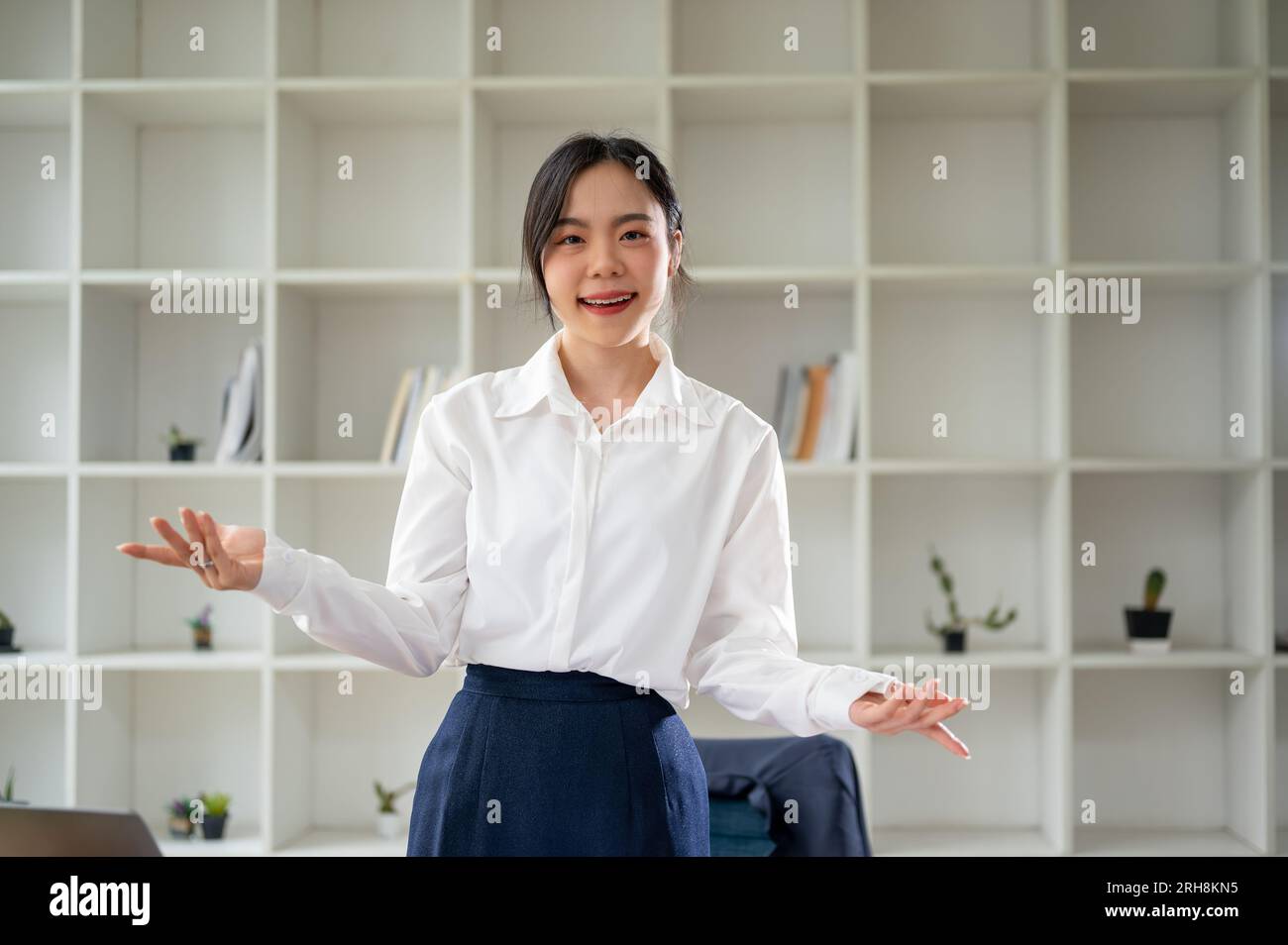 Beautiful woman manager opens hi-res stock photography and images - Alamy