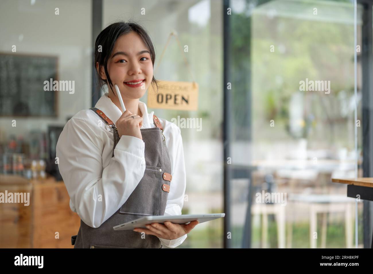Portrait waitress standing hand hi-res stock photography and images - Alamy
