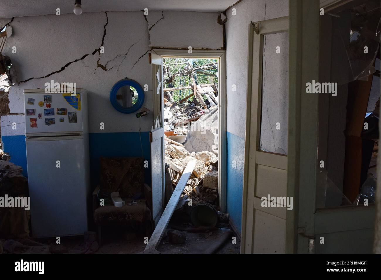 A refrigerator is seen inside the house that was destroyed by Russian ...