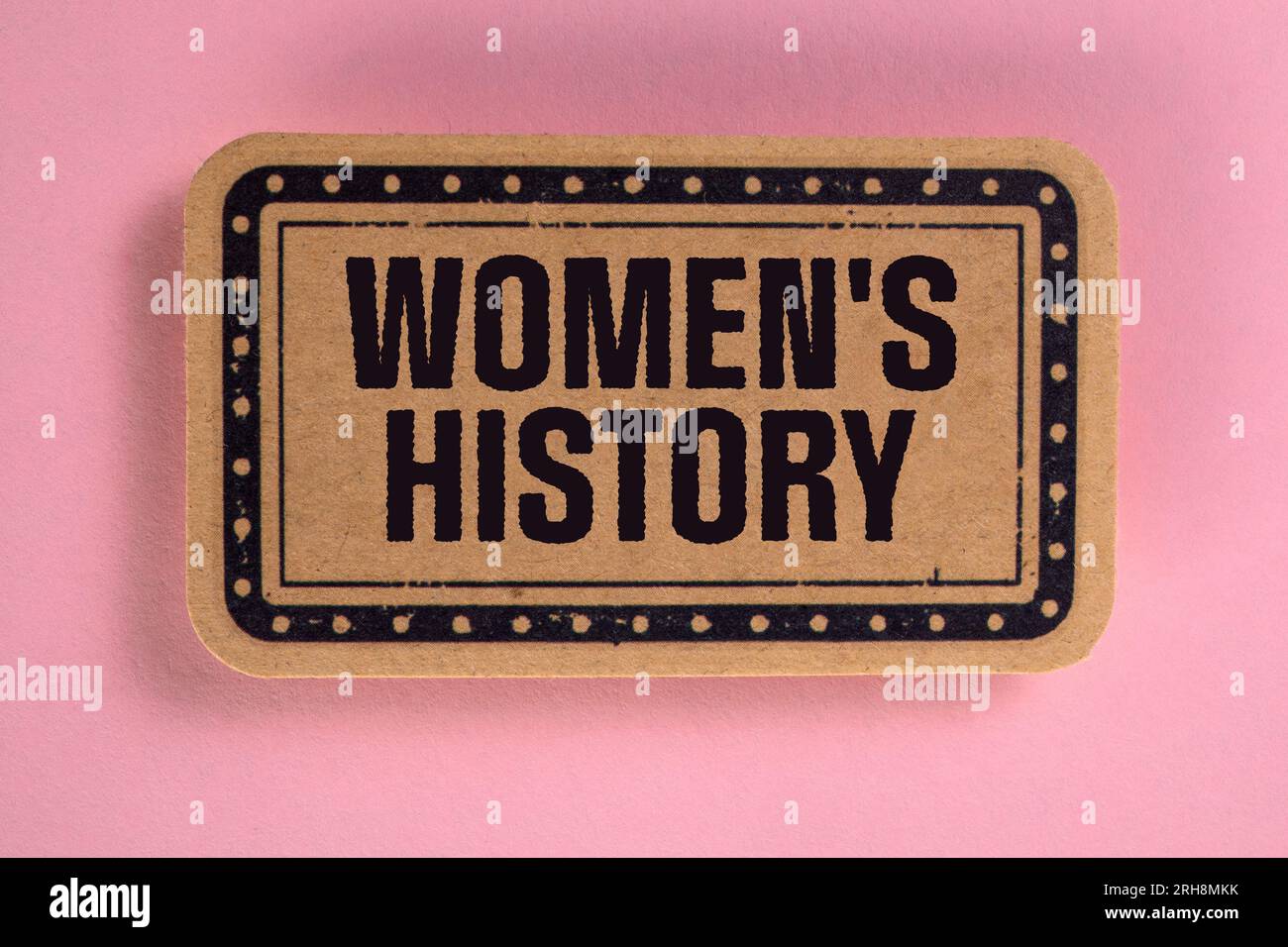 Women's history. Cardboard sticker with text on a pink background Stock ...