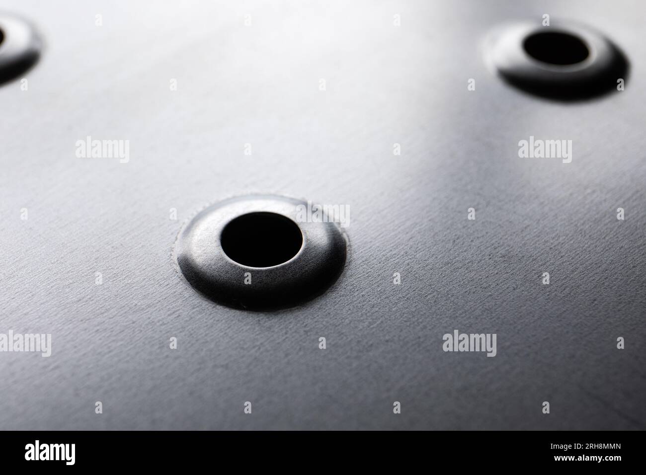 Galvanized metal plate surface with holes. Industrial style Stock Photo ...