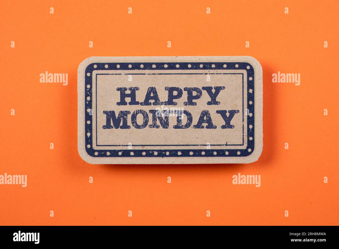 Happy Monday. Cardboard sticker with text on an orange background Stock ...