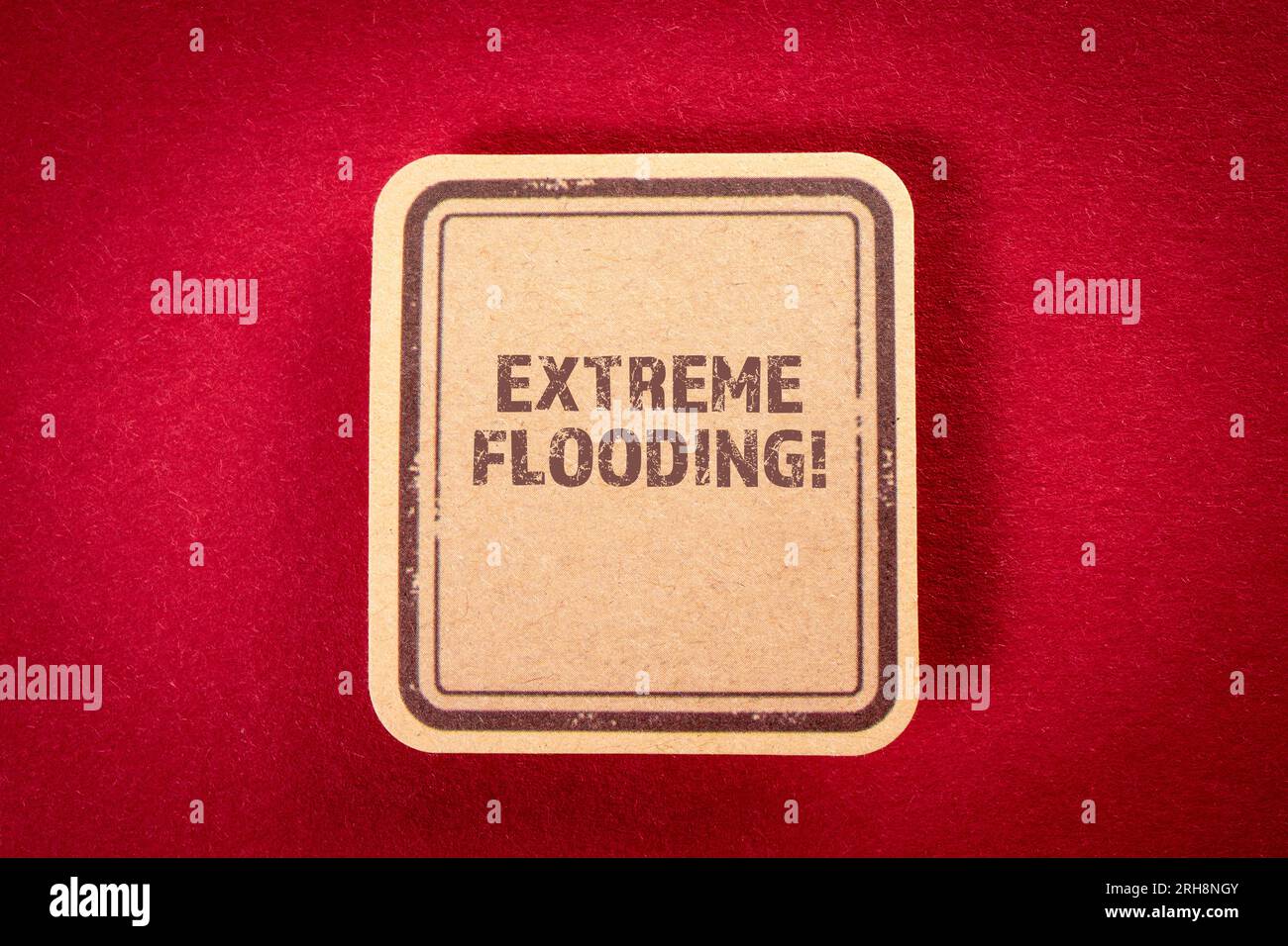 Extreme Flooding Concept. Sticky note with text on a red background ...